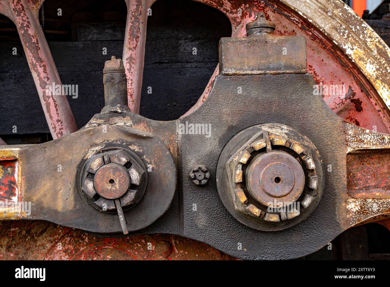 Detailed view of old rusty steam train mechanics wheels and gears ...