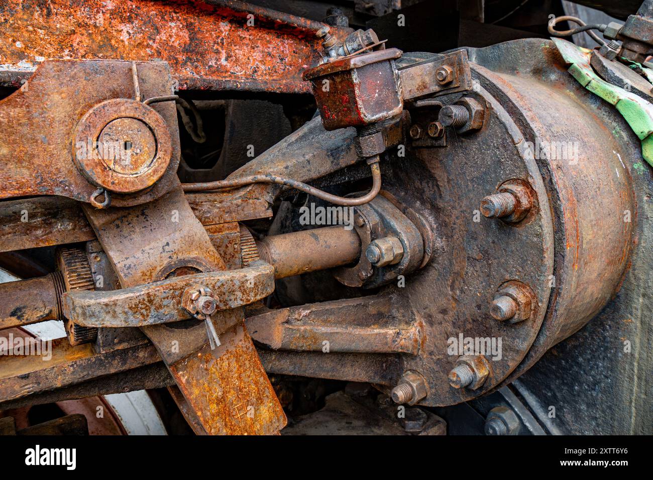 Detail of an old rusty steam train mechanism rusted metal components in ...