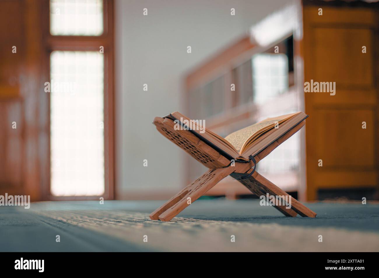 The Holy Quran: The sacred book of Muslims, beautifully displayed in a ...