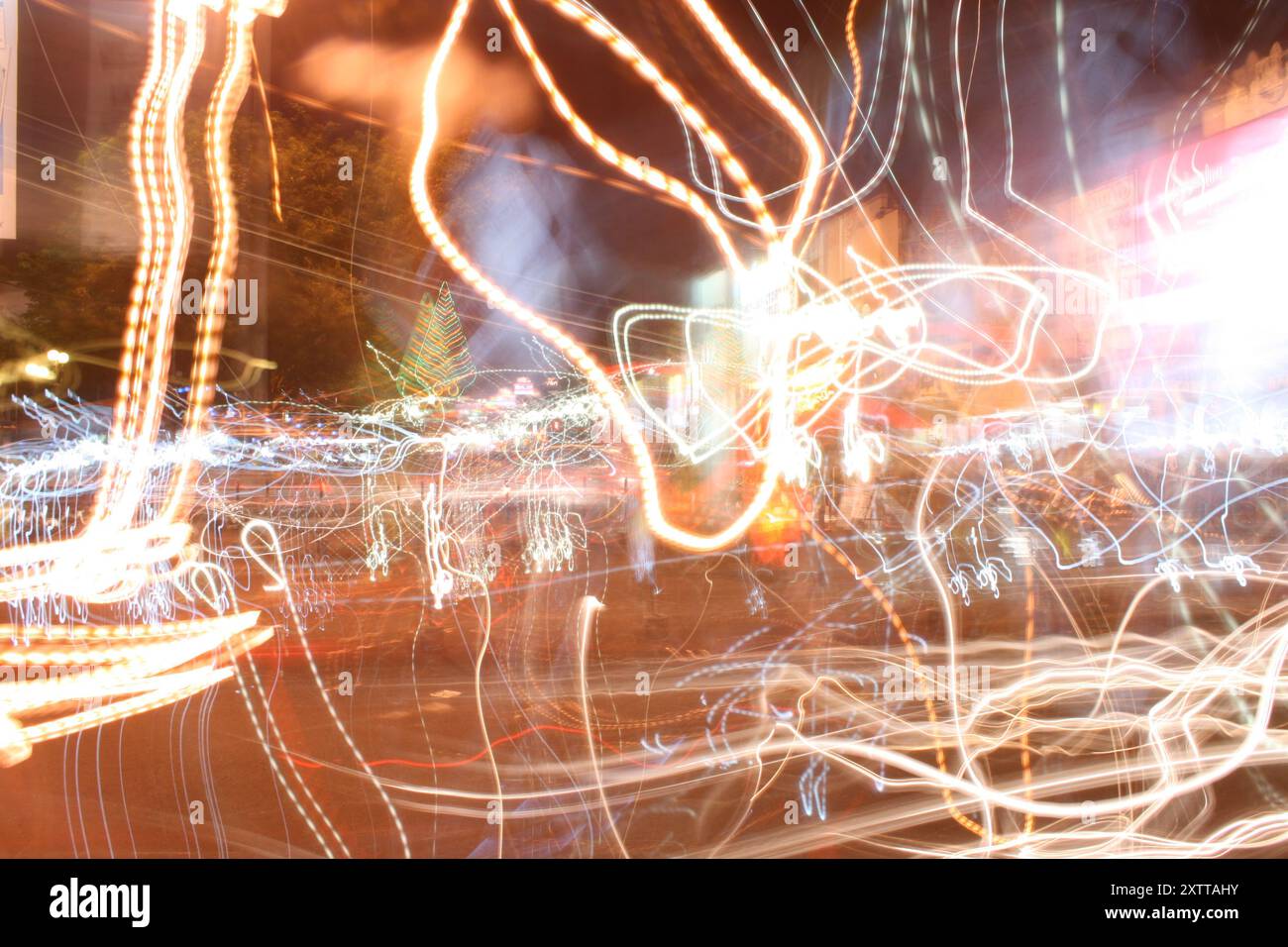 The random flashes of light from vehicle lighting and street lamps ...