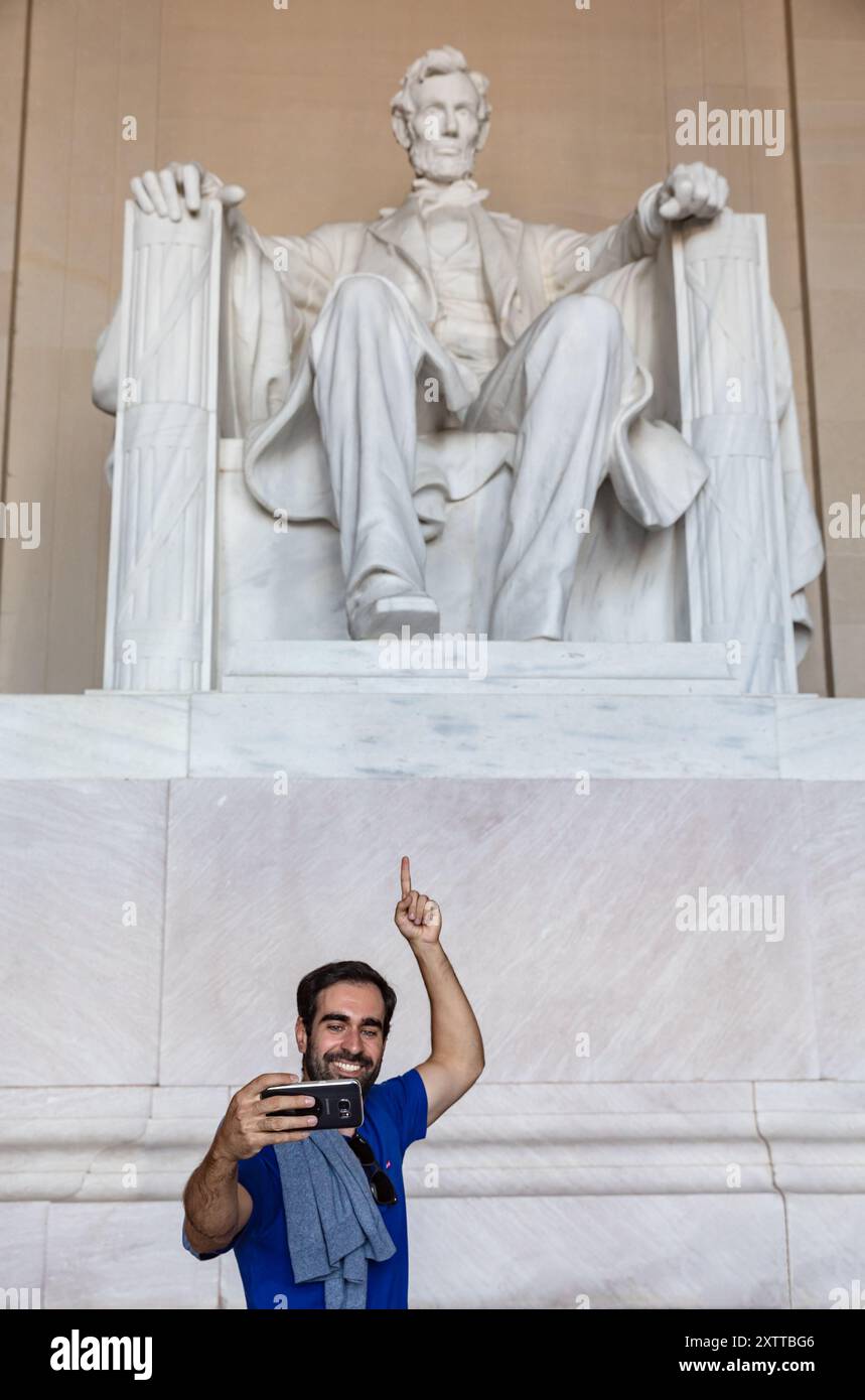 Washington DC, USA - Oct. 10, 2022: Tourists take photos in front of a ...