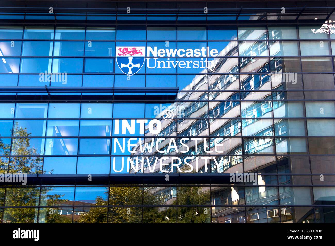 sign and shield on glass window building for newcastle university ...