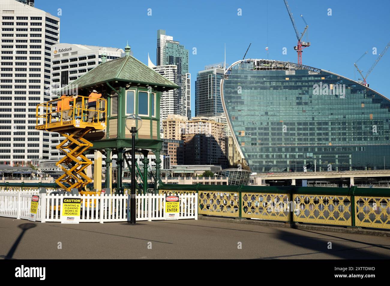 Men working on the elevated Control Cab on the swing span of Pyrmont ...