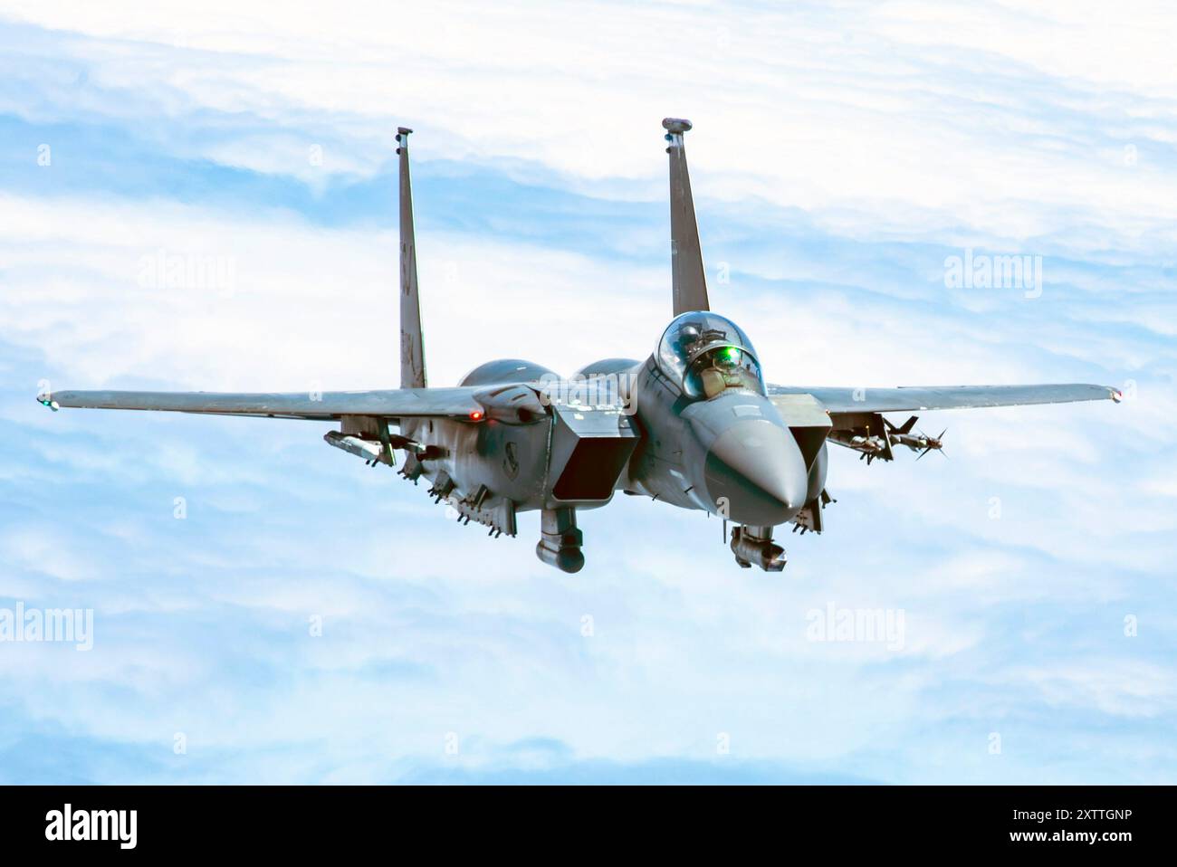 An F-15E Strike Eagle with the 4th Fighter Wing approaches a KC-135 ...