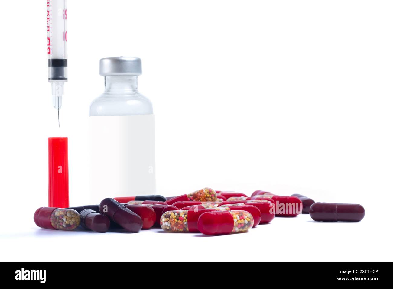 Medicine bottle with syringe and pills isolated on white background ...