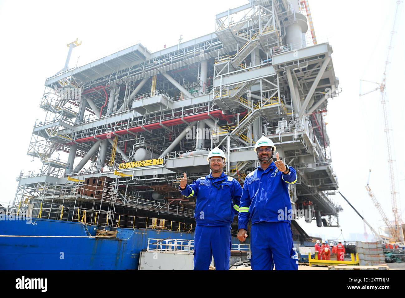 QINGDAO, CHINA - AUGUST 16, 2024 - Foreign engineering workers pose for ...