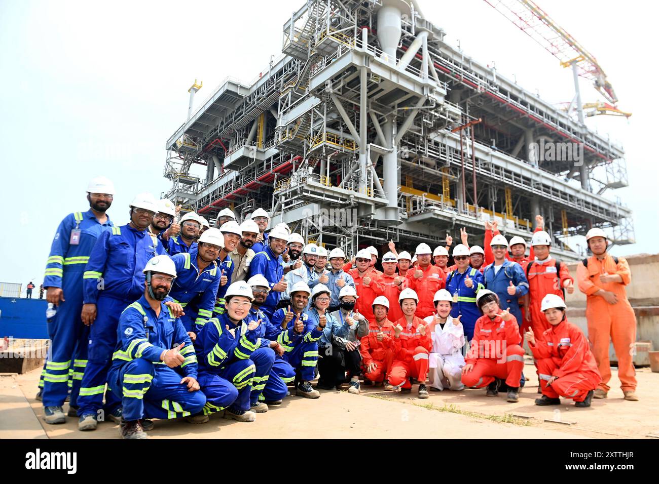 QINGDAO, CHINA - AUGUST 16, 2024 - Chinese and foreign engineers pose ...