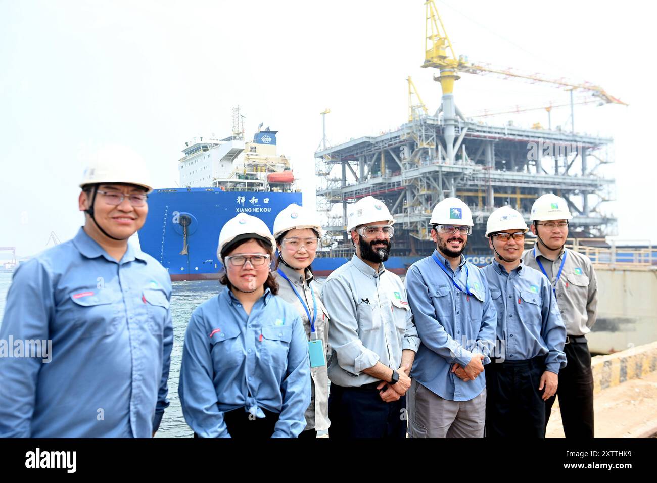 QINGDAO, CHINA - AUGUST 16, 2024 - Chinese and foreign engineers pose ...
