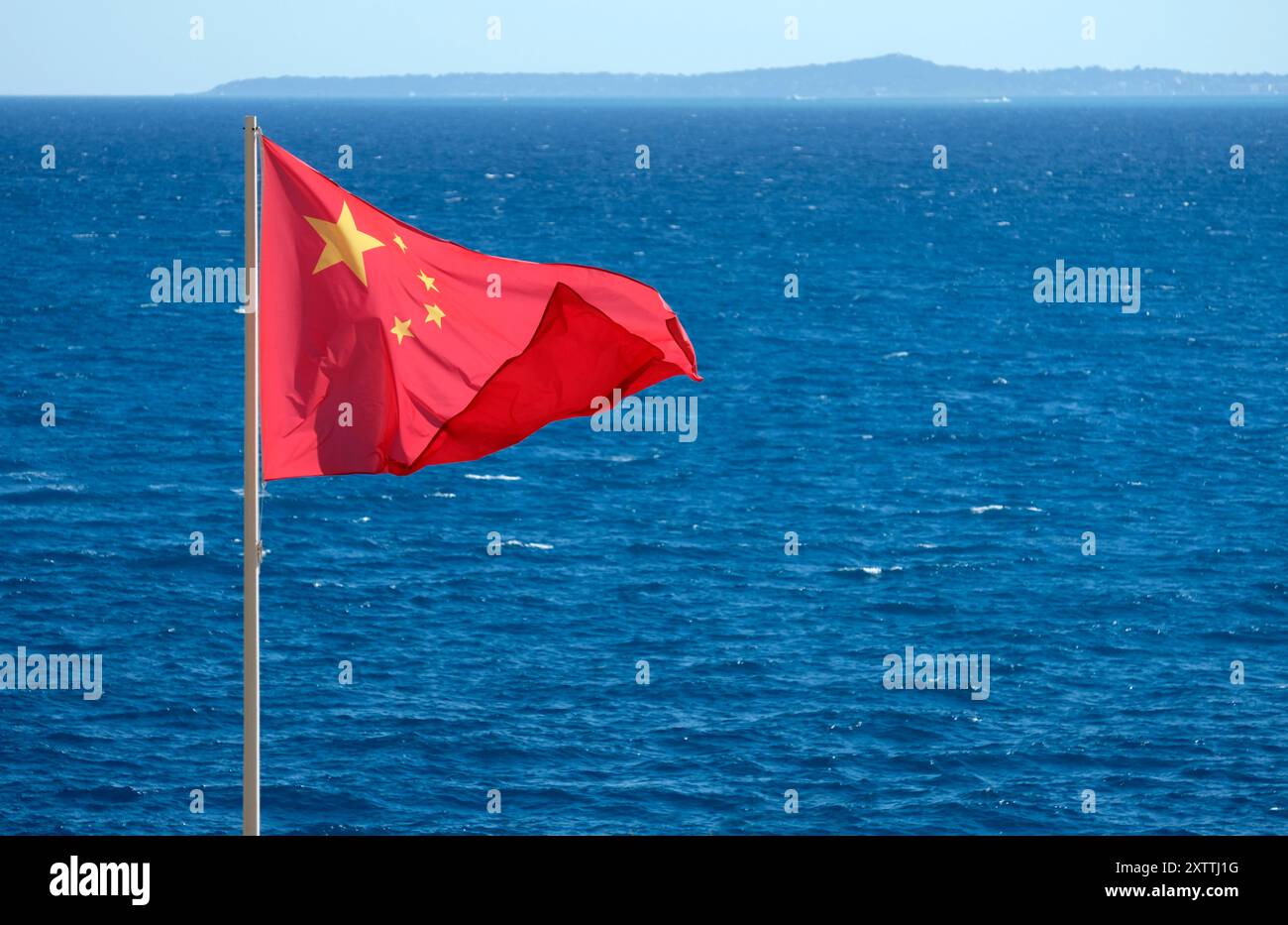 Chinese national flag at the coast near the sea Stock Photo - Alamy