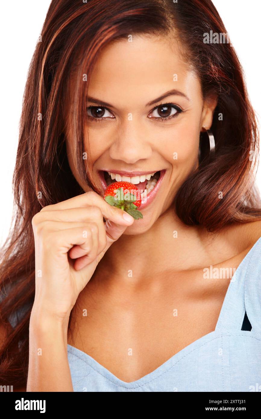 Studio, portrait and woman with strawberry for wellness, nutrition and ...