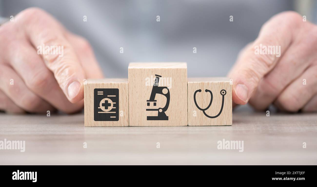 Wooden blocks with symbol of medical research concept Stock Photo - Alamy