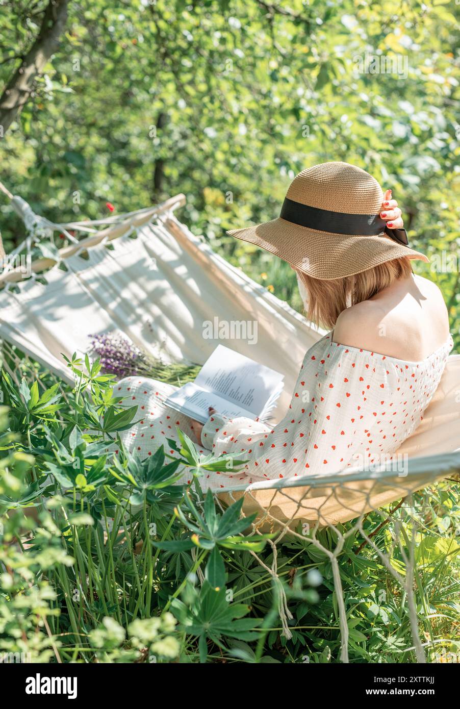 Young female resting in yard hi-res stock photography and images - Alamy