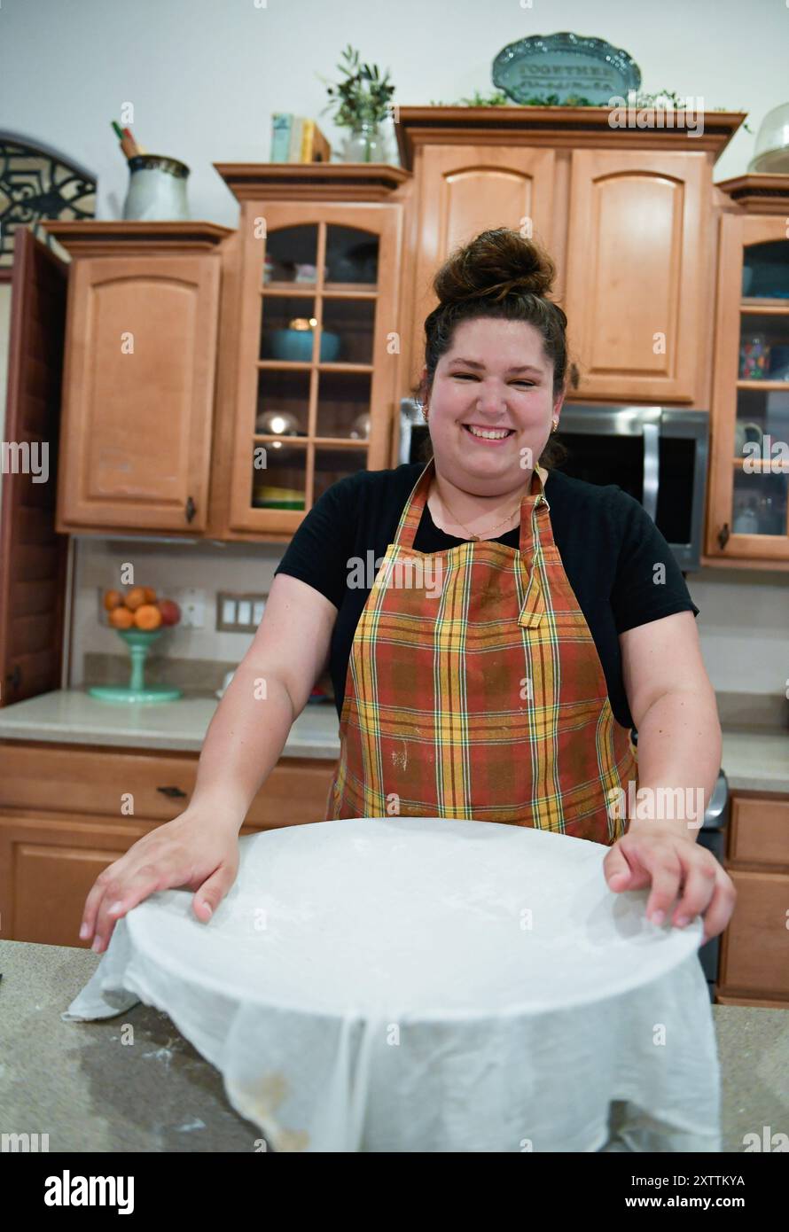 Woman in apron covering hi-res stock photography and images - Alamy