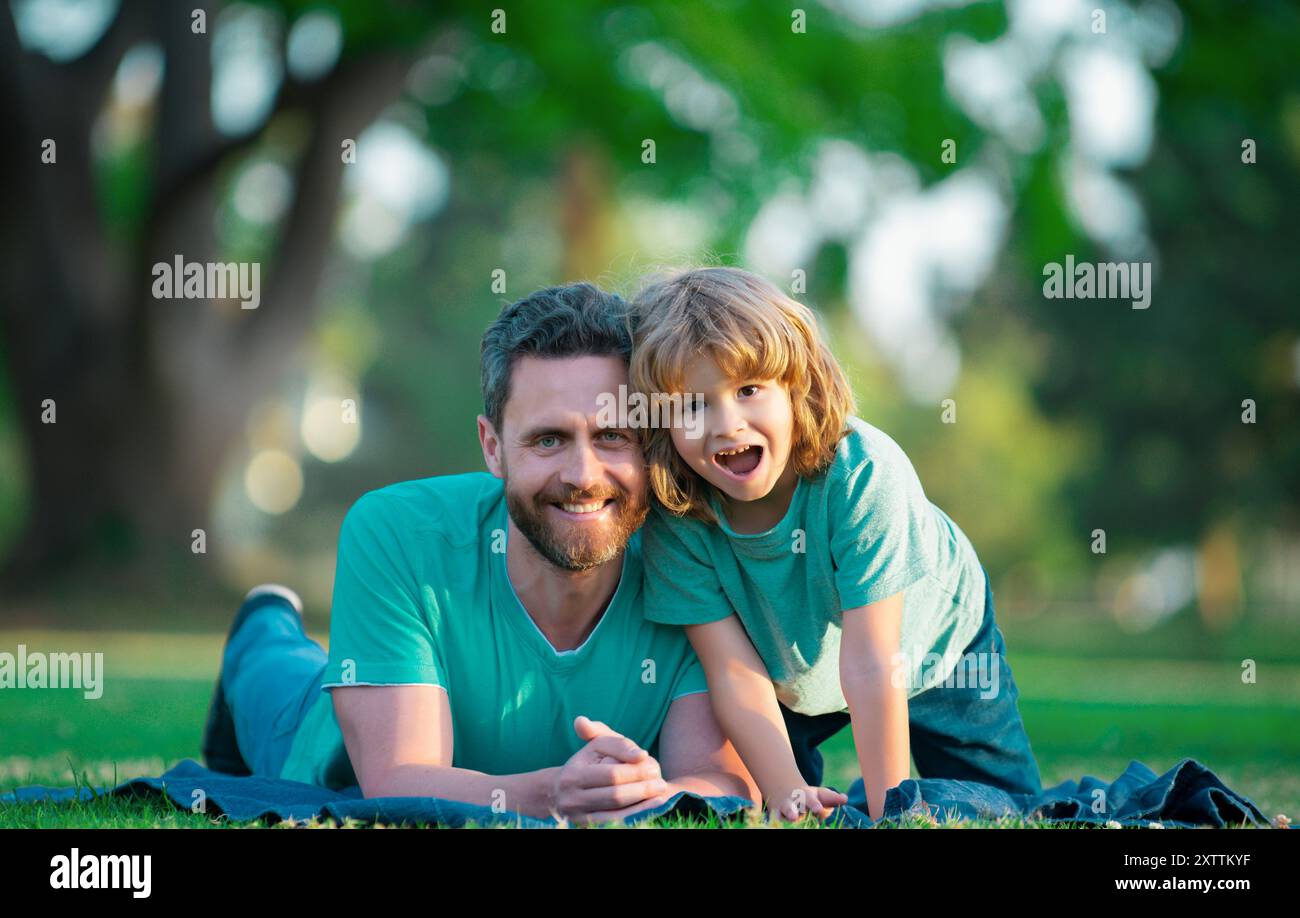 Childhood and parenthood kids concept. Happy father and son playing ...