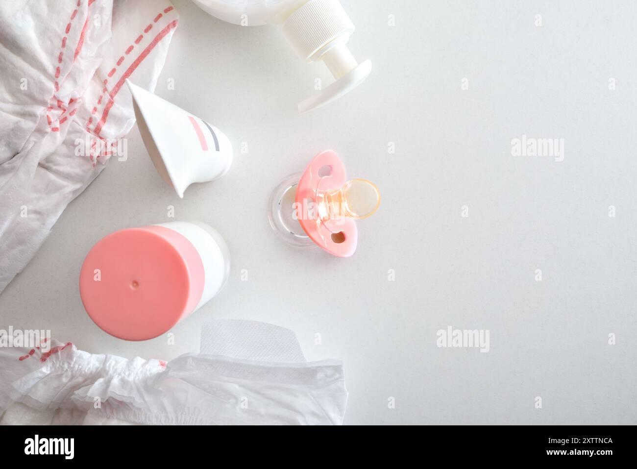 Creams for changing the baby's diaper with pink tones. Top view Stock ...