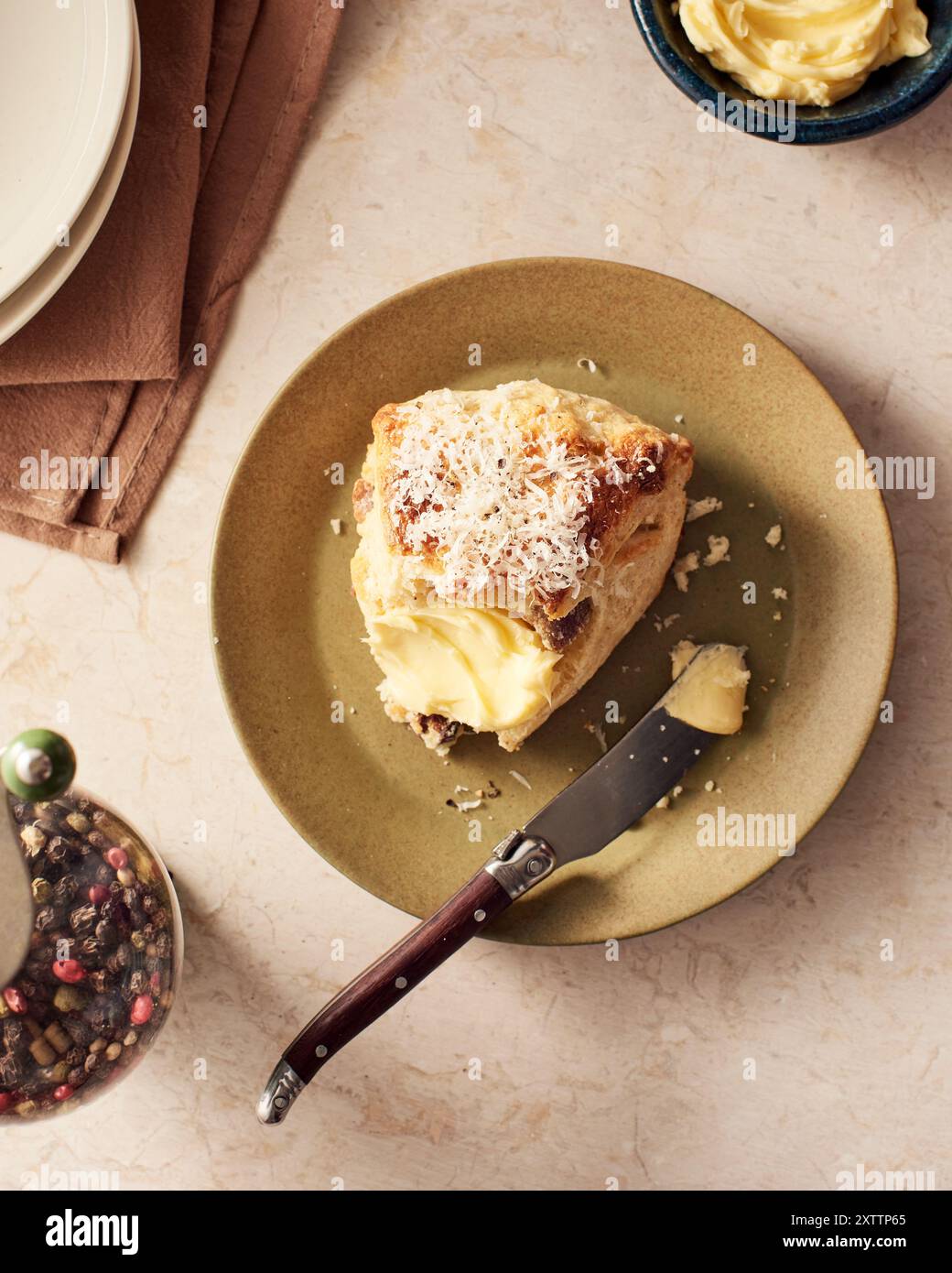 Single Savory Scone with butter Stock Photo - Alamy