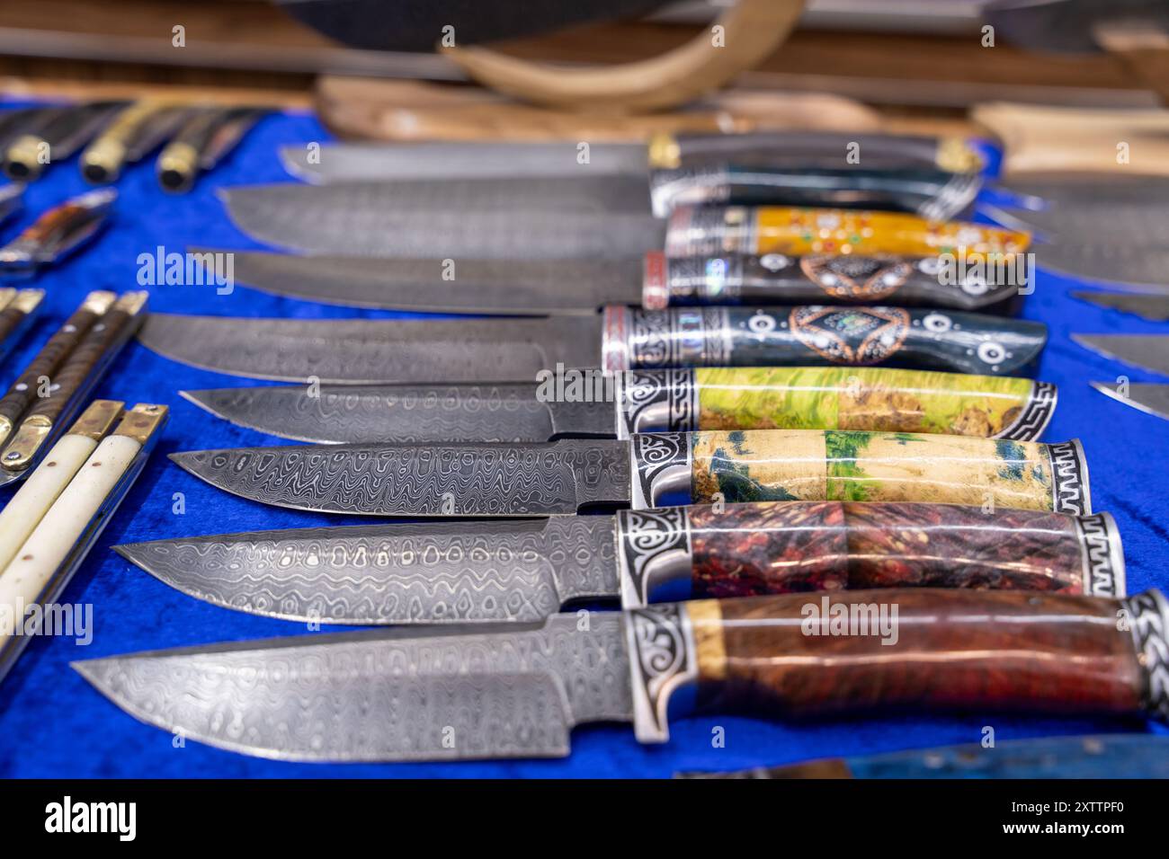 A collection of knives with different colors Stock Photo - Alamy