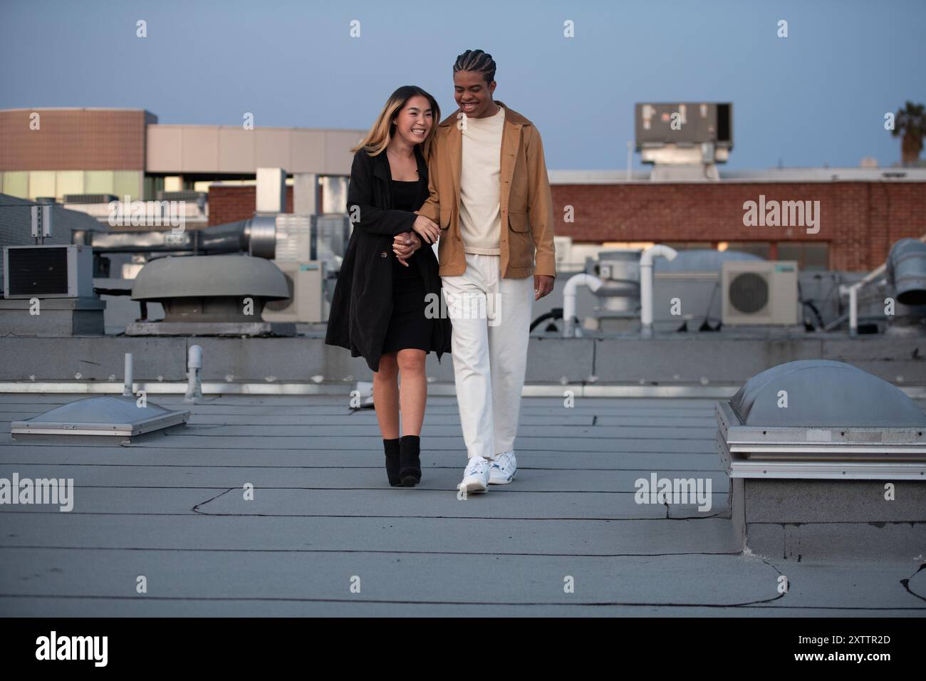 Happy multiracial couple walking hi-res stock photography and images ...