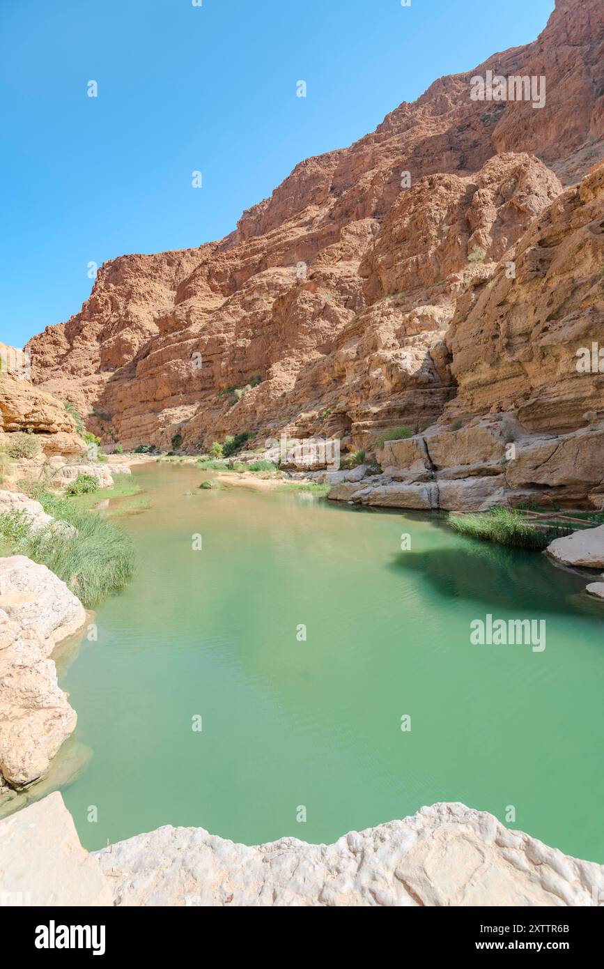 Scenic view of Wadi Ash Shab's gorge and river in Oman, showcasing ...