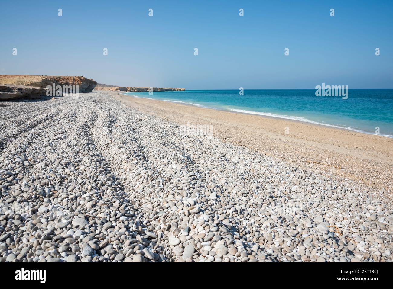 Pebble beach near Tiwi village, Sultanate of Oman, a scenic travel ...