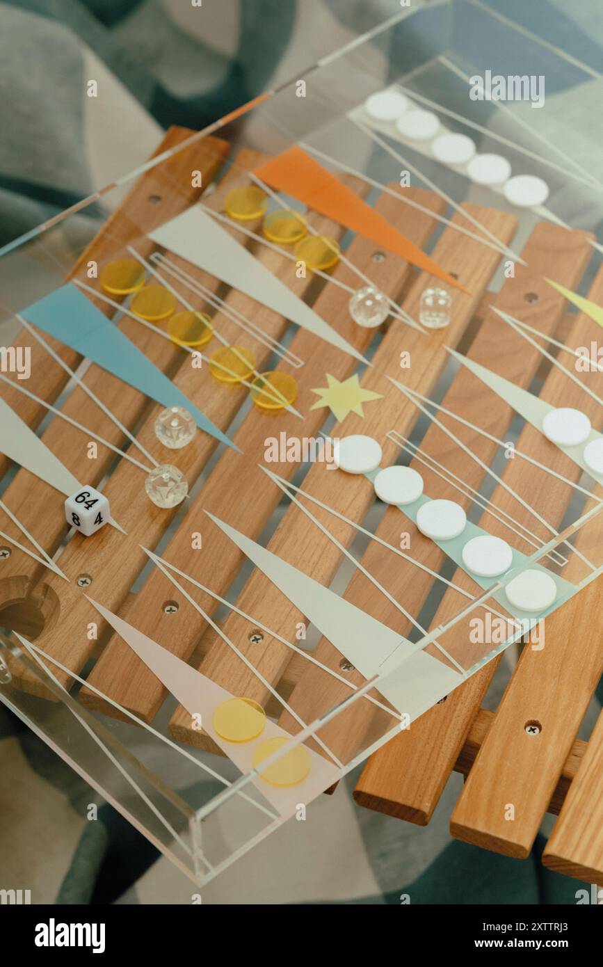 Colorful backgammon game on a wooden surface Stock Photo - Alamy