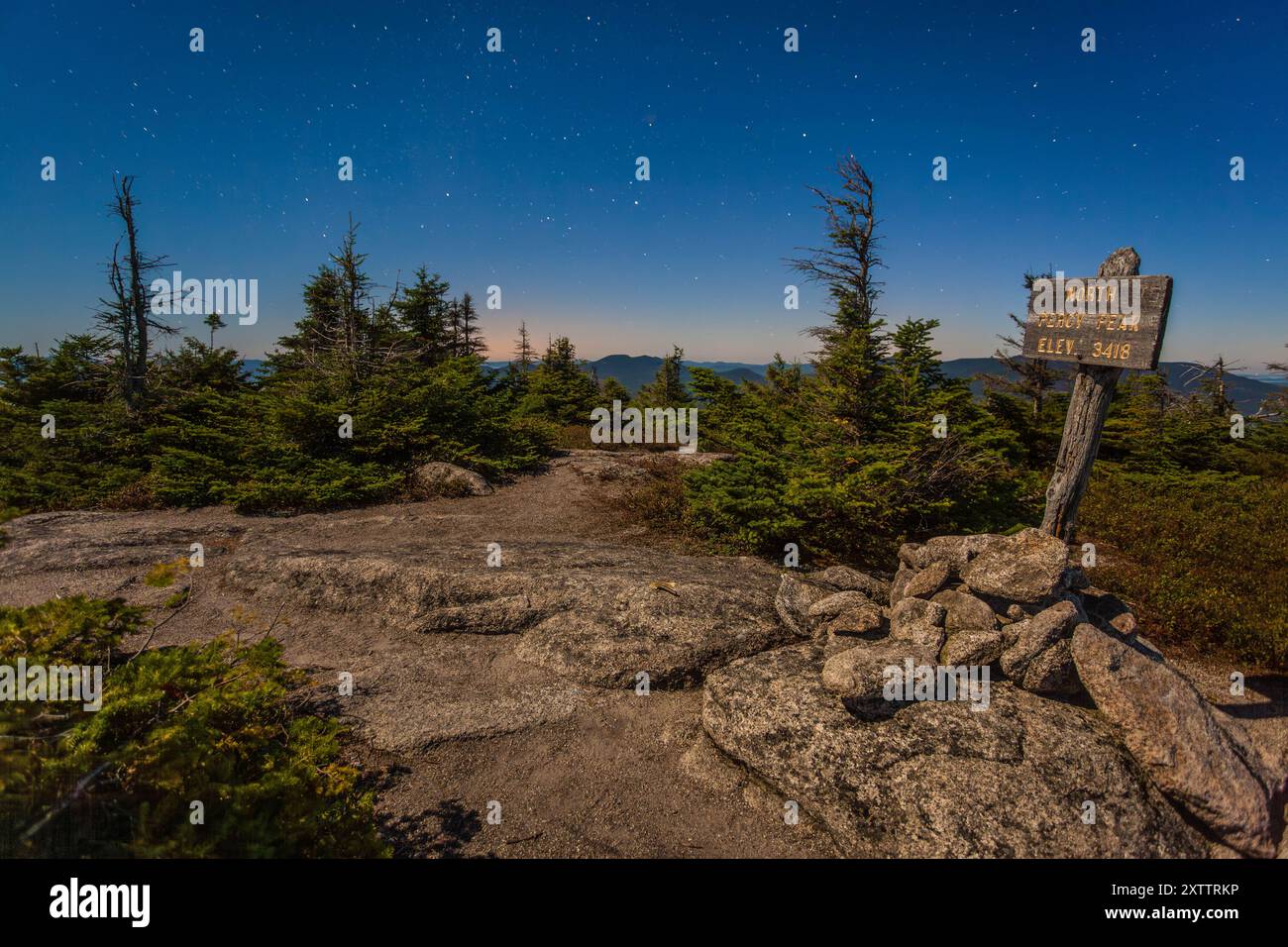 Summit of North Percy Peak under the stars at night in New Hamps Stock ...