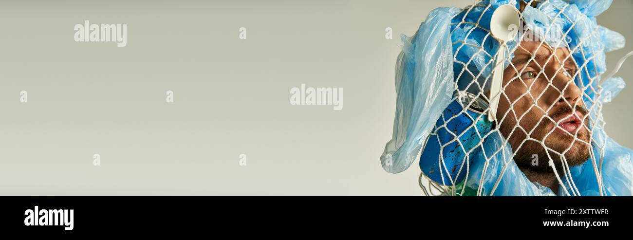 A man's face is obscured by plastic bags and a net Stock Photo - Alamy