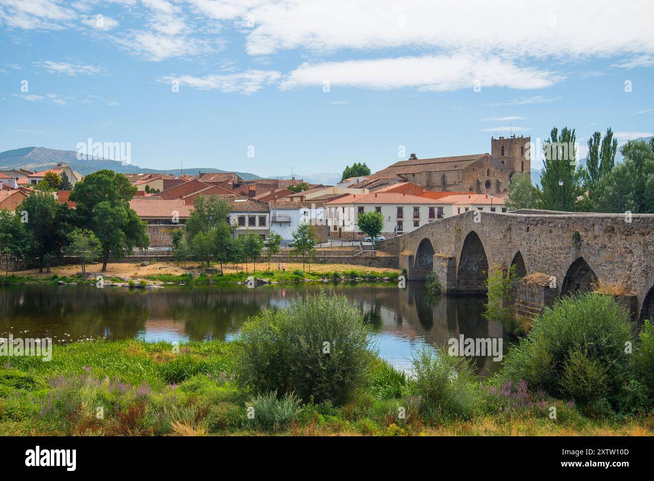 River Tormes, medieval bridge and overview of the village. El Barco de ...