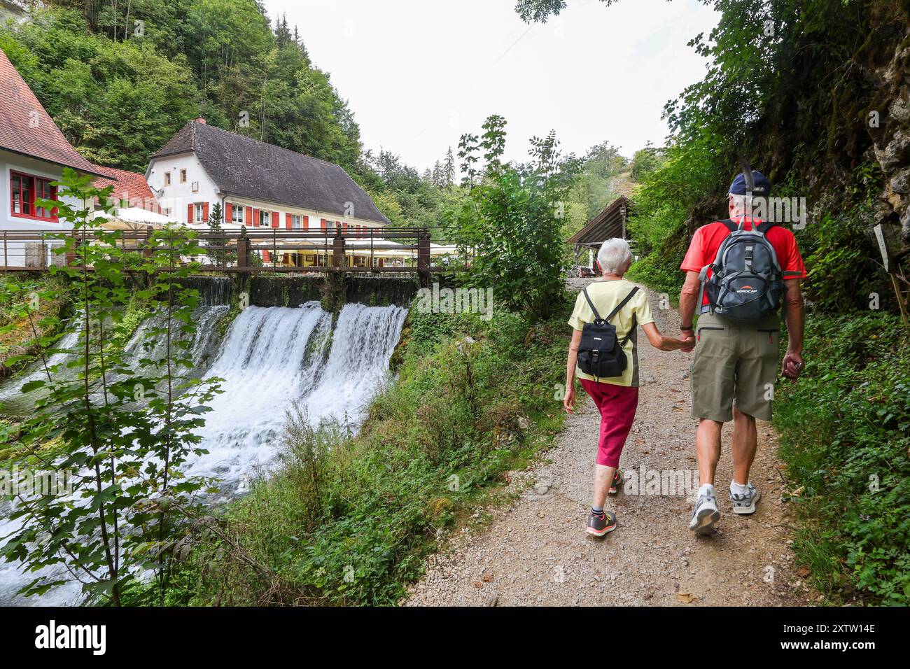 Hayingen, Germany. 16th Aug, 2024. A couple walks along a hiking trail ...