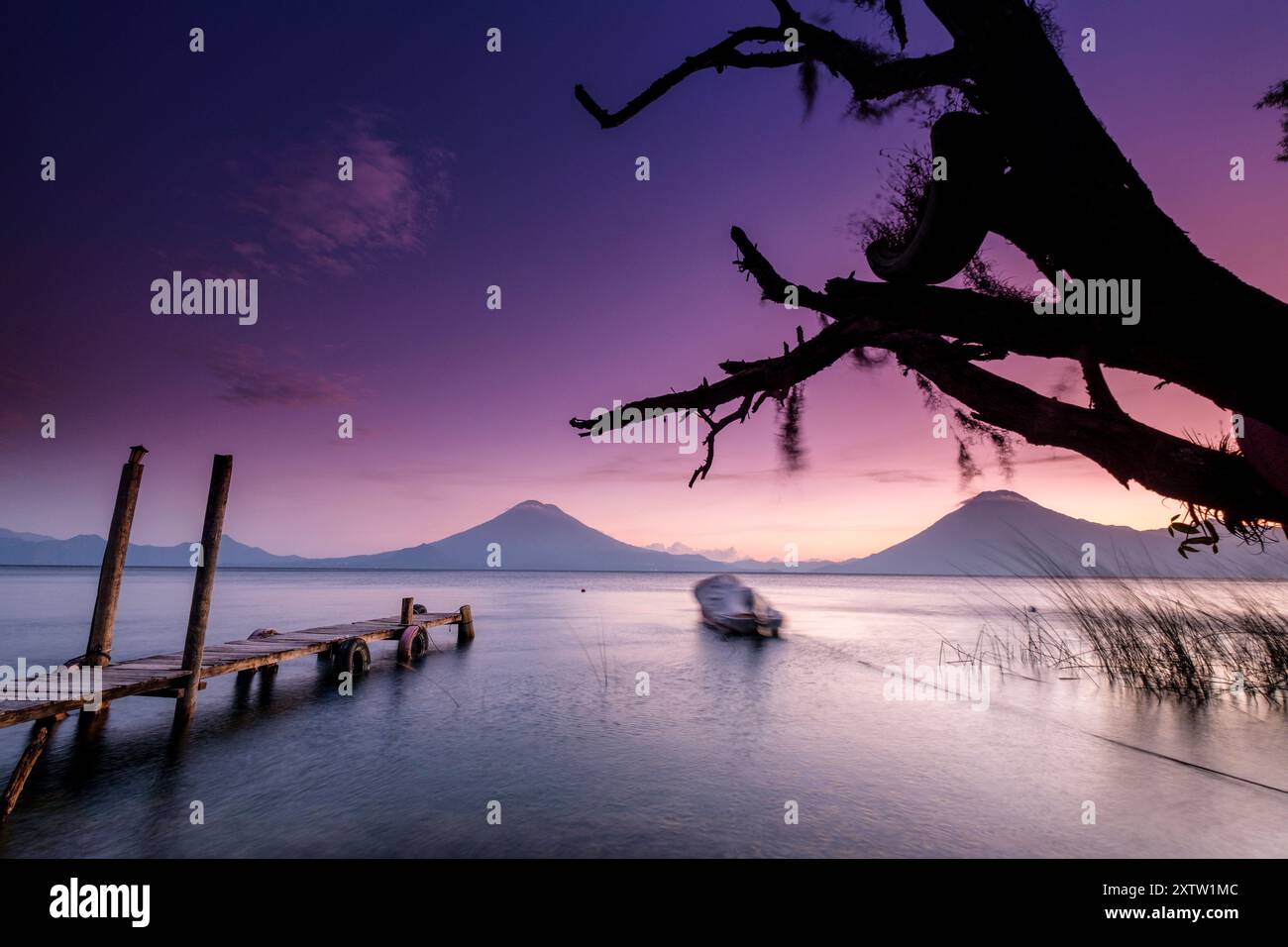 Traditional moorings and volcanoes of Atitlan 3537 m. and San Pedro ...