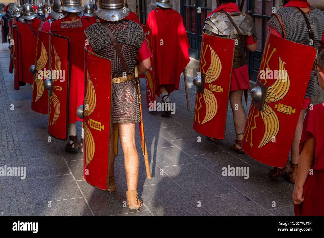 Roman legionaries with metal armor and shield at a historical ...
