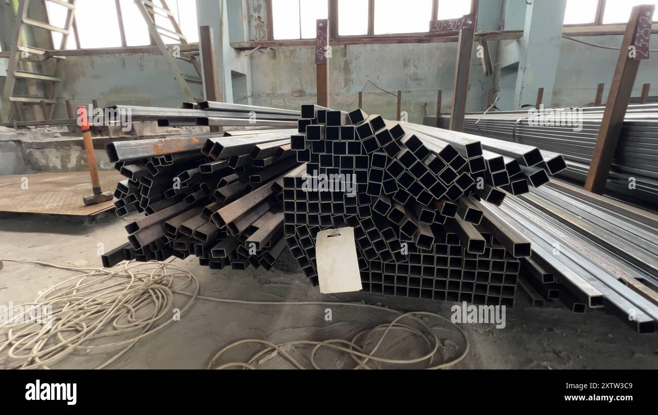 Metal profile in the store's warehouse Stock Photo - Alamy