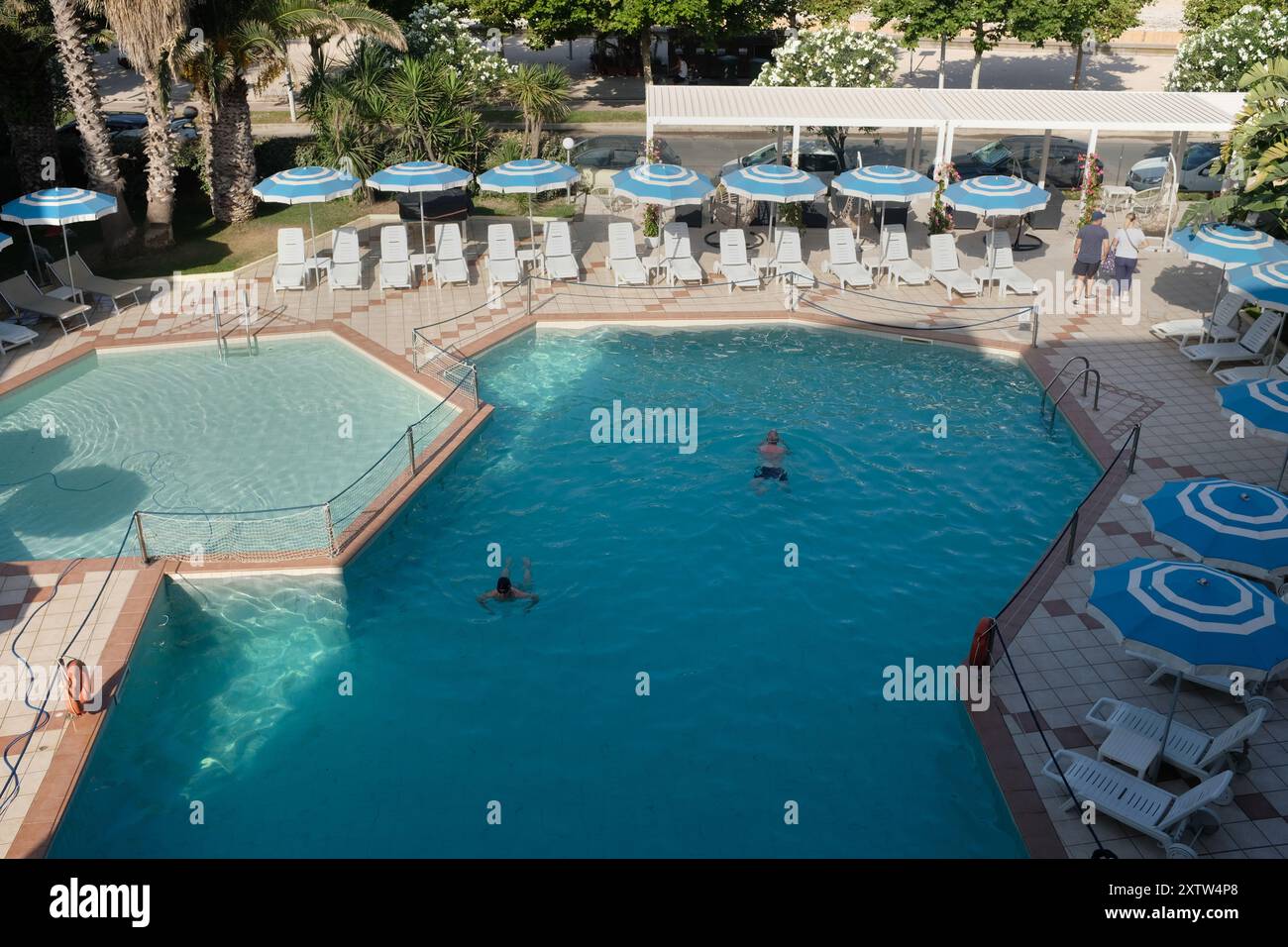 early morning swimming in a hotel pool Stock Photo - Alamy