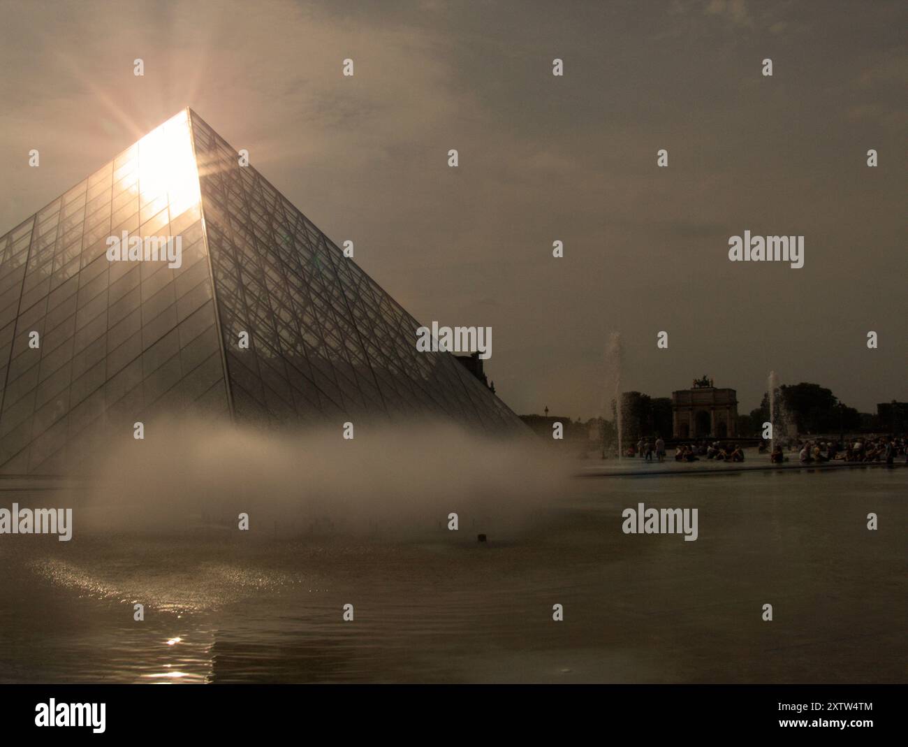 Louvre Pyramide at Louvre Museum - Palais Royal. On the background ...