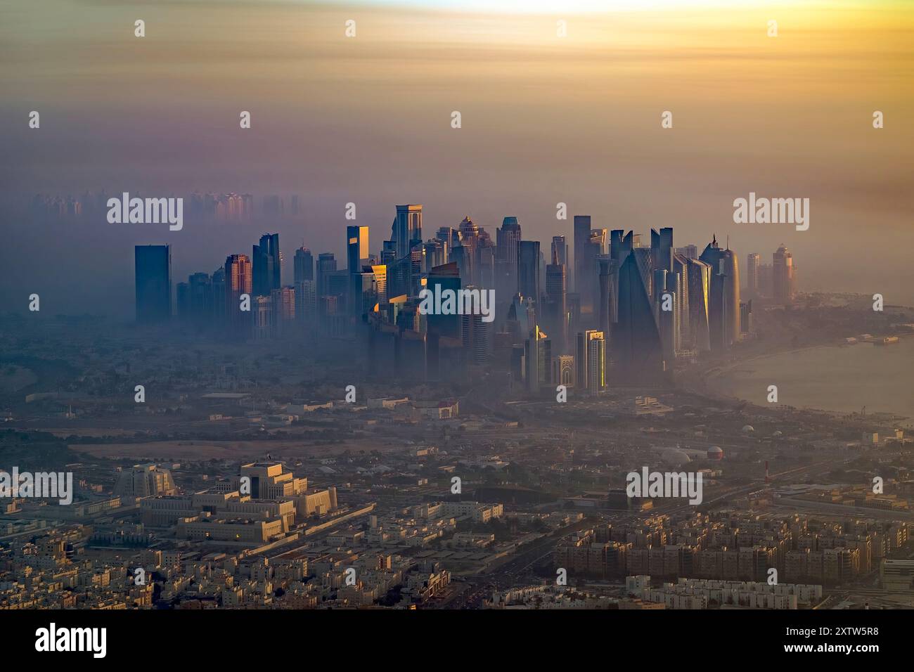 Aerial Panoramic skyline of Doha, Qatar during sunrise Stock Photo - Alamy