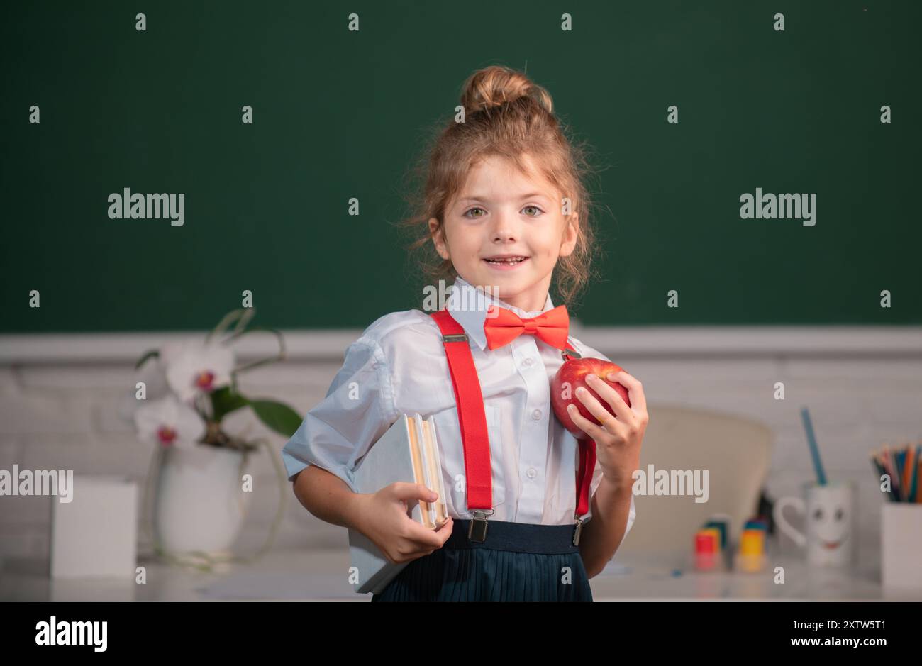 Little school girl student learning in class, study english language at ...