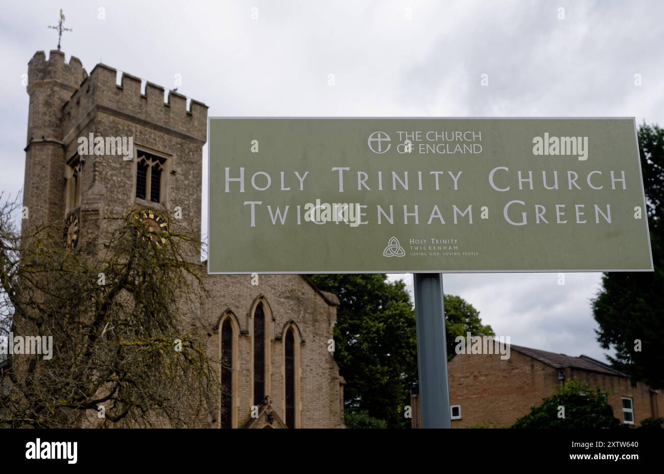 The Holy Trinity Church and name sign on Twickenham Green
