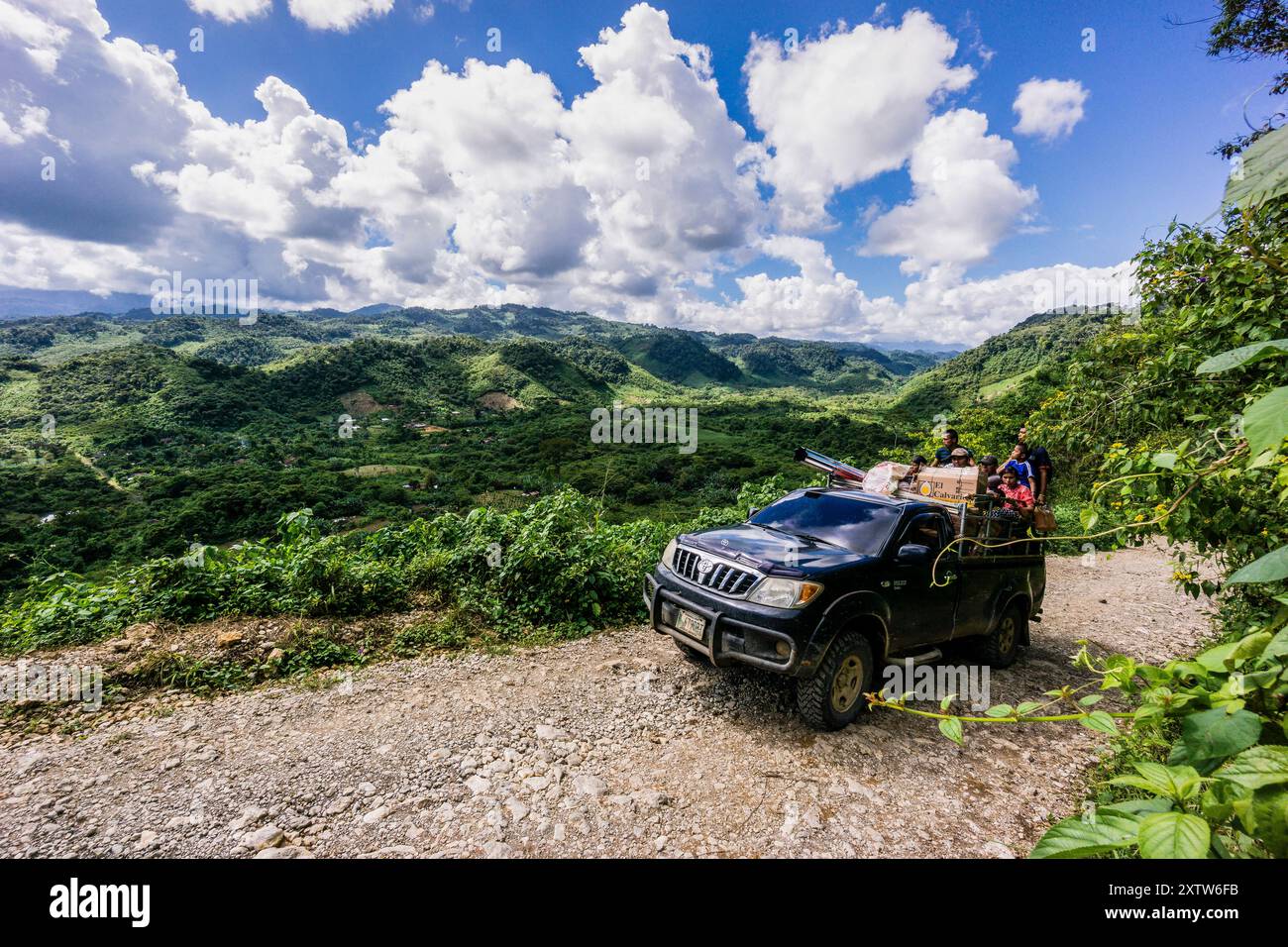 Off-road vehicle on the road in the rainforest near Saquixpec, Sierra ...