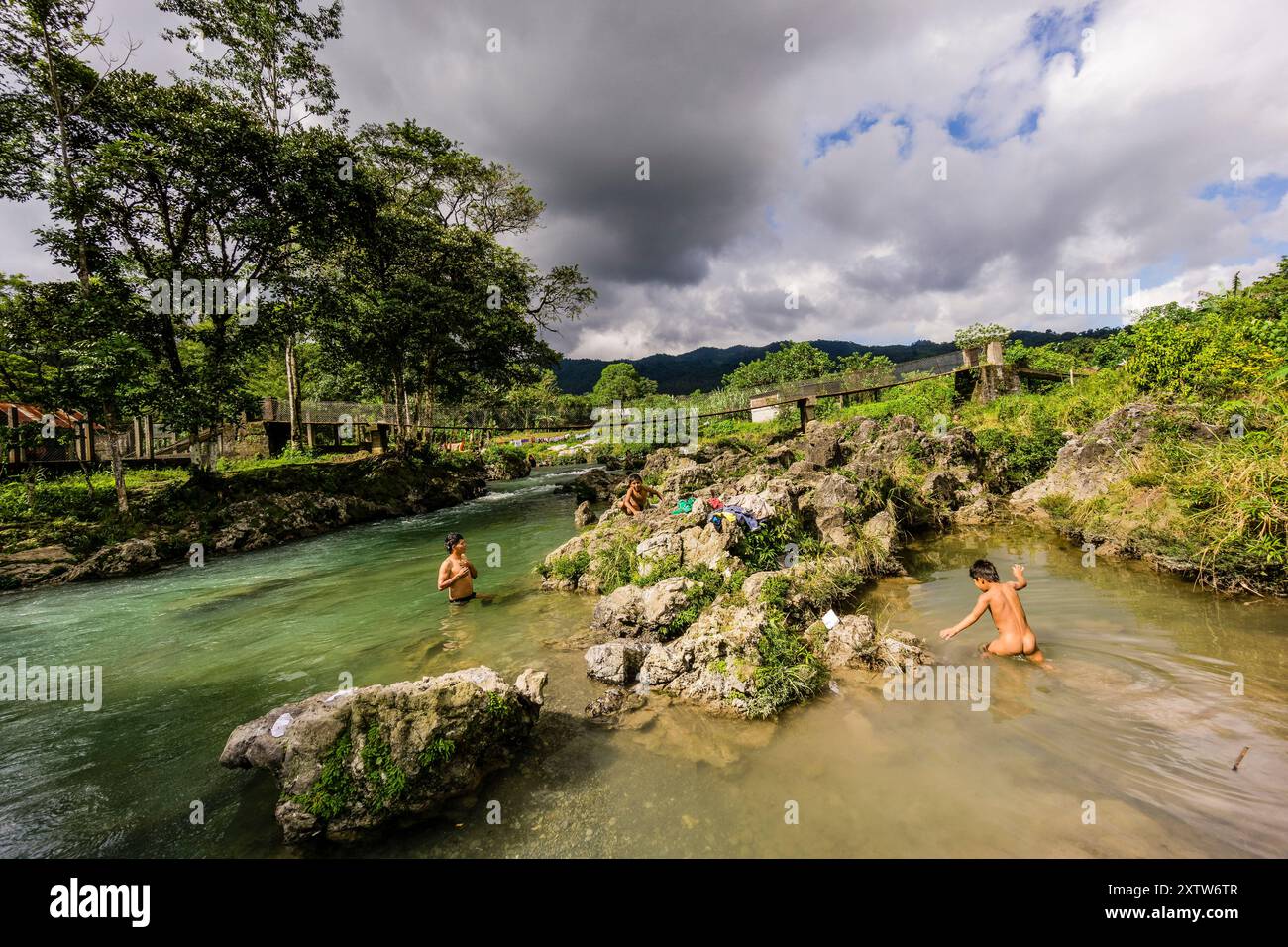 Washing clothes in the Cuatro Chorros river, Lancetillo, La Parroquia ...