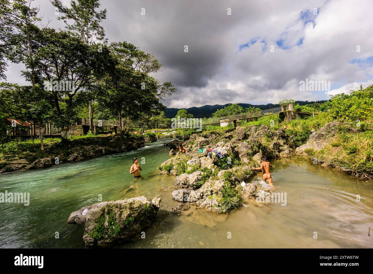 Washing clothes in the Cuatro Chorros river, Lancetillo, La Parroquia ...