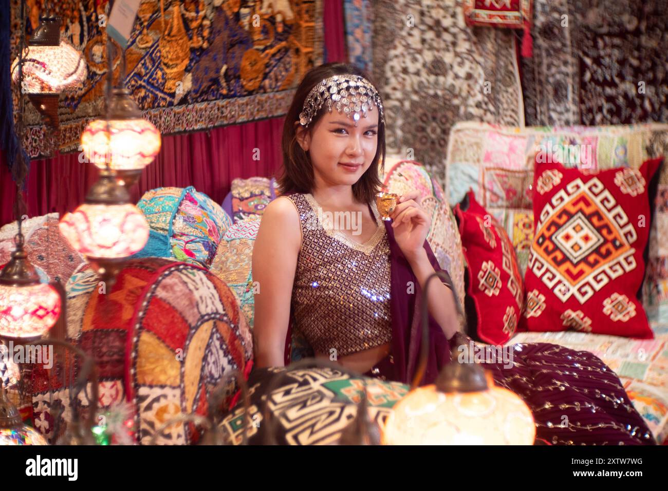 Beautiful Asian women in traditional Turkish fashion evening dress ...