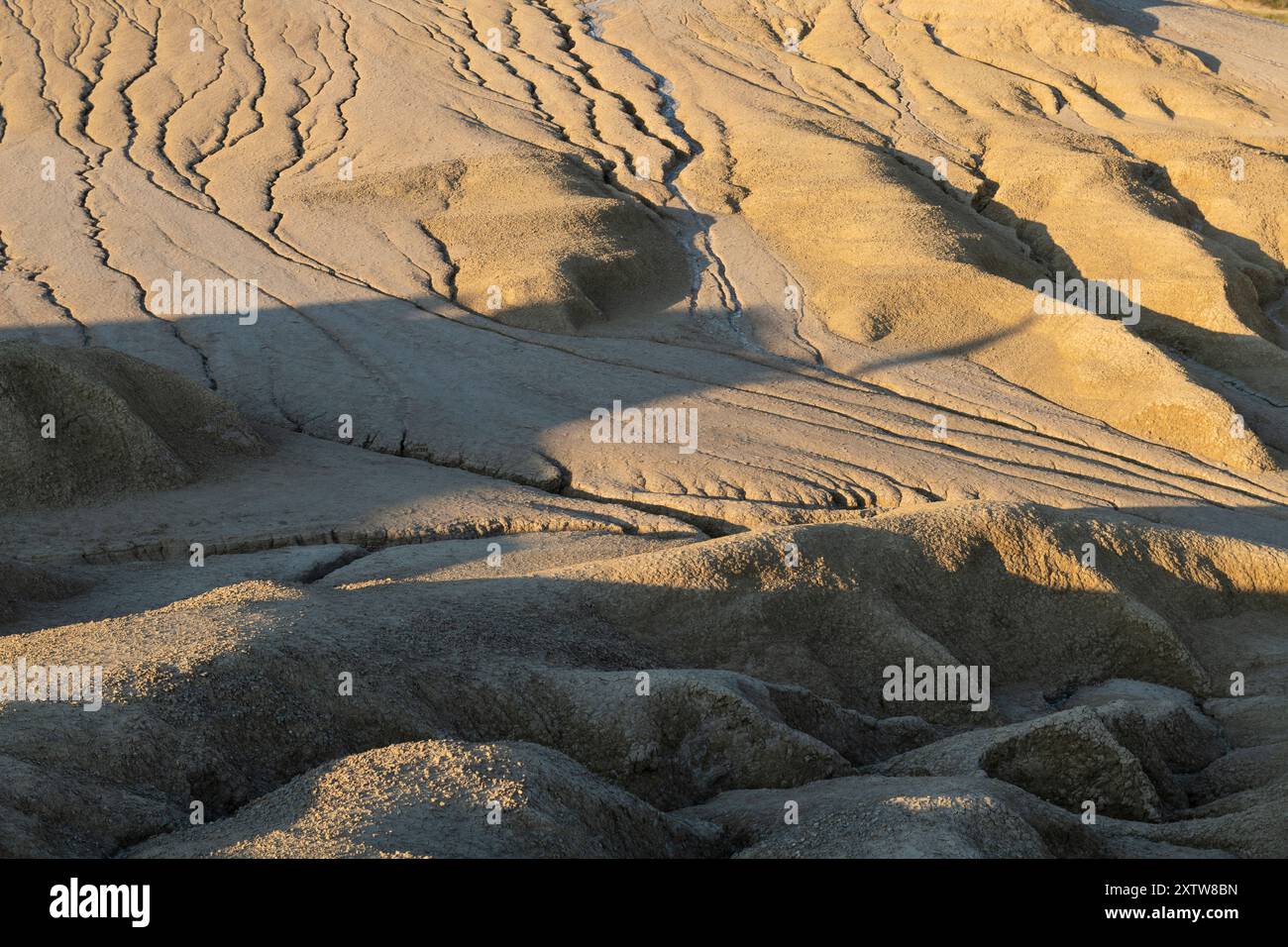 Arid landscape with mud rivers formations in Romania. This is a unique ...