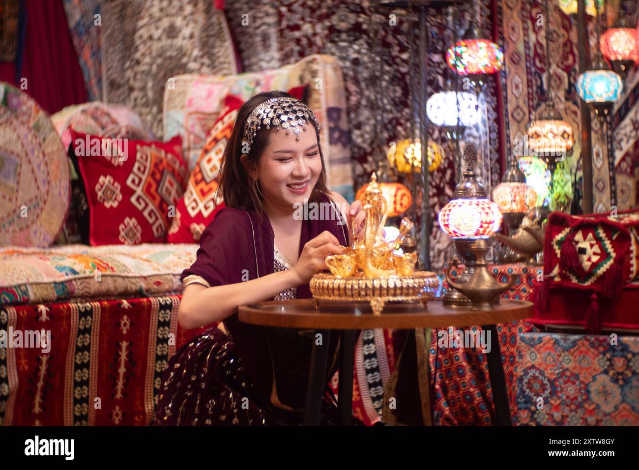Beautiful Asian women in traditional Turkish fashion evening dress ...