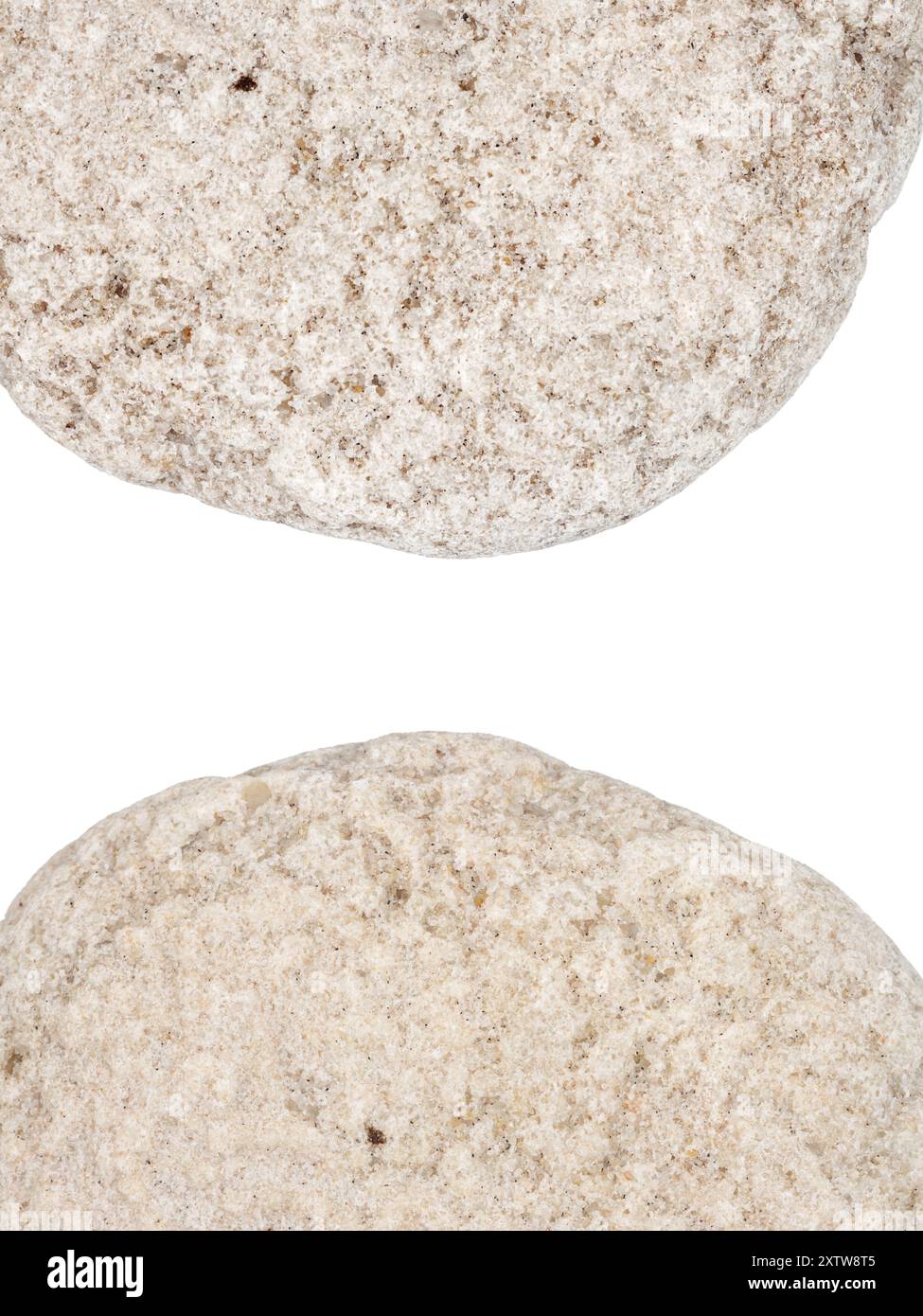 Edges of two pebbles isolated on white background with a space for text ...