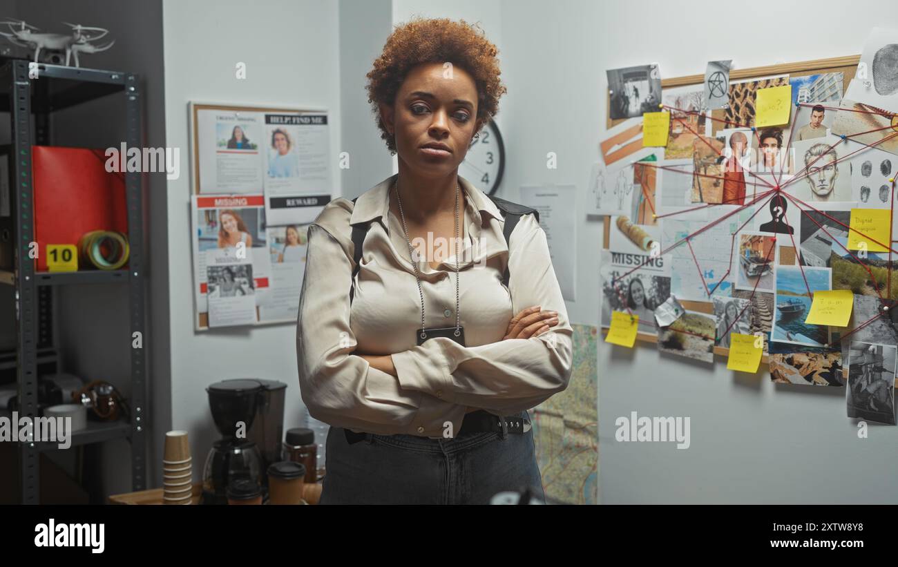 Confident african american woman detective stands with arms crossed in ...