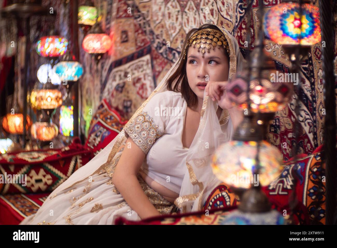 Beautiful Asian women in traditional Turkish fashion evening dress ...