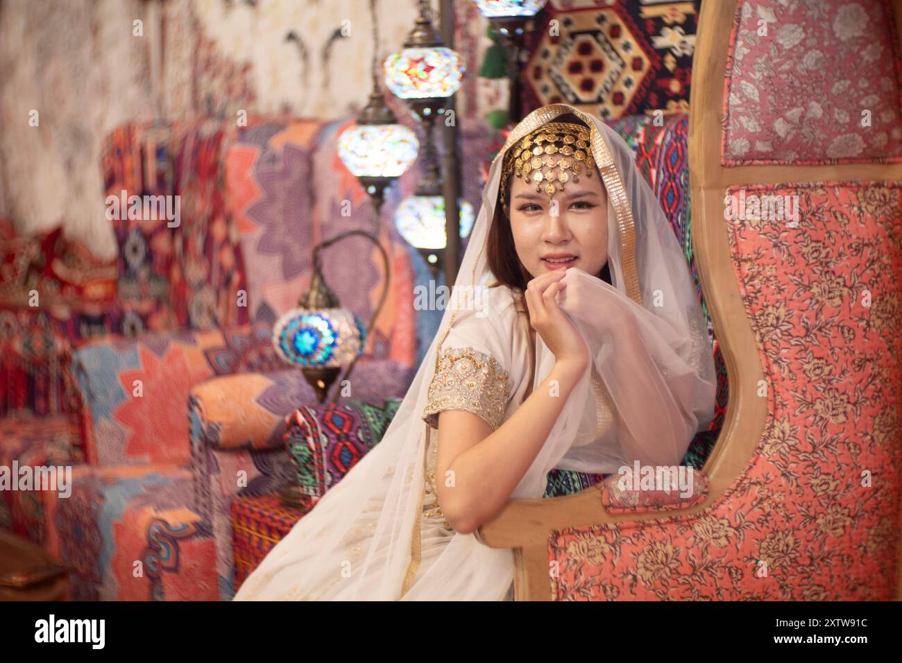 Beautiful Asian women in traditional Turkish fashion evening dress ...