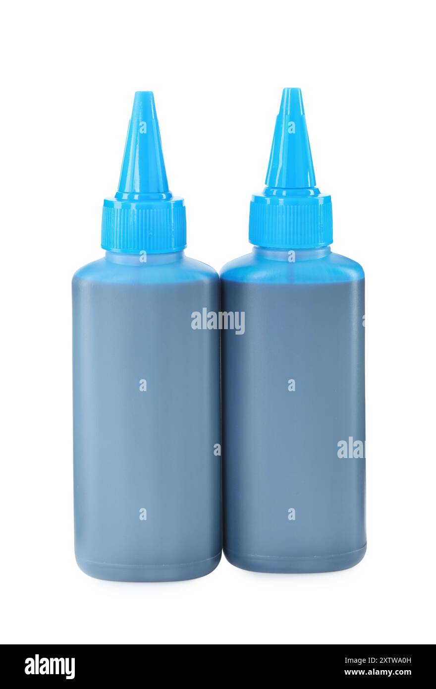 Bottles of light blue printer ink isolated on white Stock Photo - Alamy