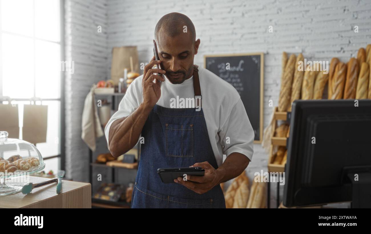 Handsome man in bakery using hi-res stock photography and images - Alamy