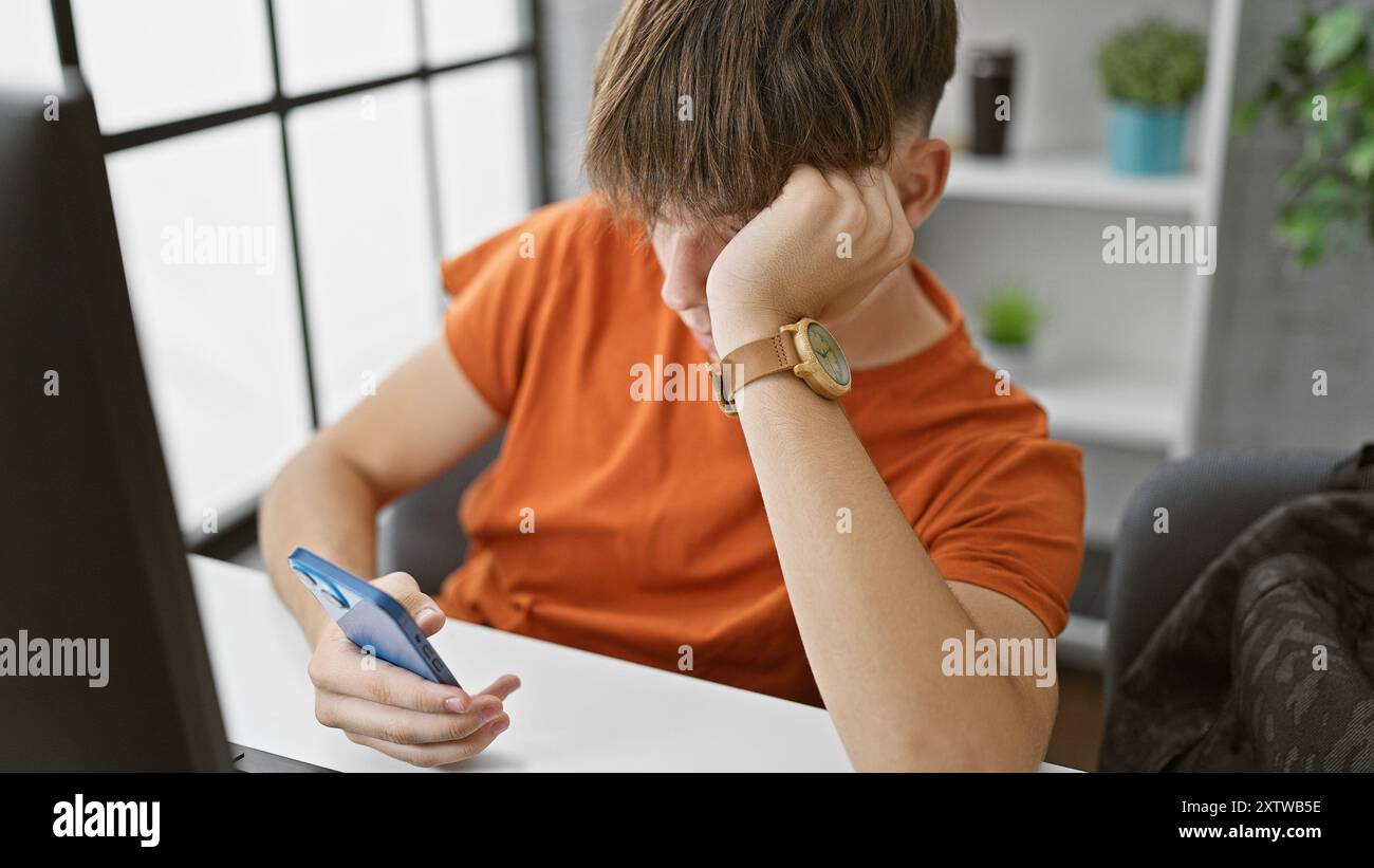 Stressed teenager studying with smartphone in modern classroom Stock ... Stressed teenager studying with smartphone in modern classroom Stock ...